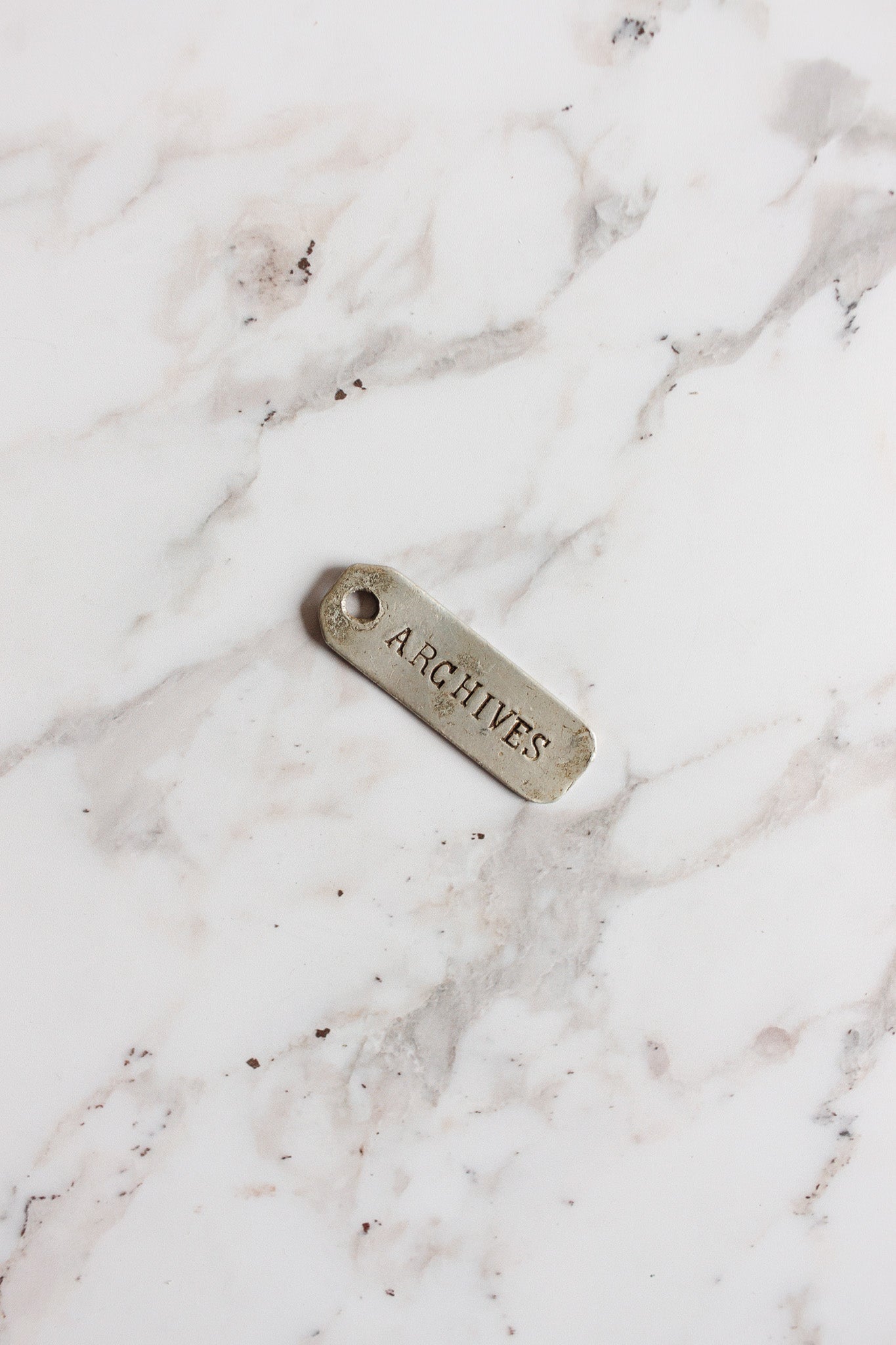 antique French metal key fob – Joliette